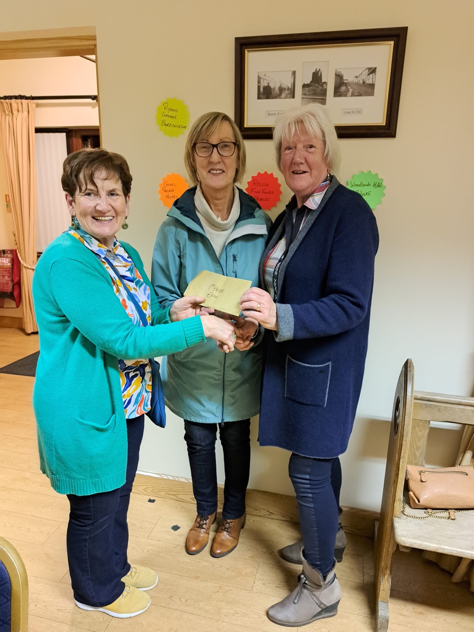 Marian Powell and Maureen Corcoran receiving their winnings from Dolly ...